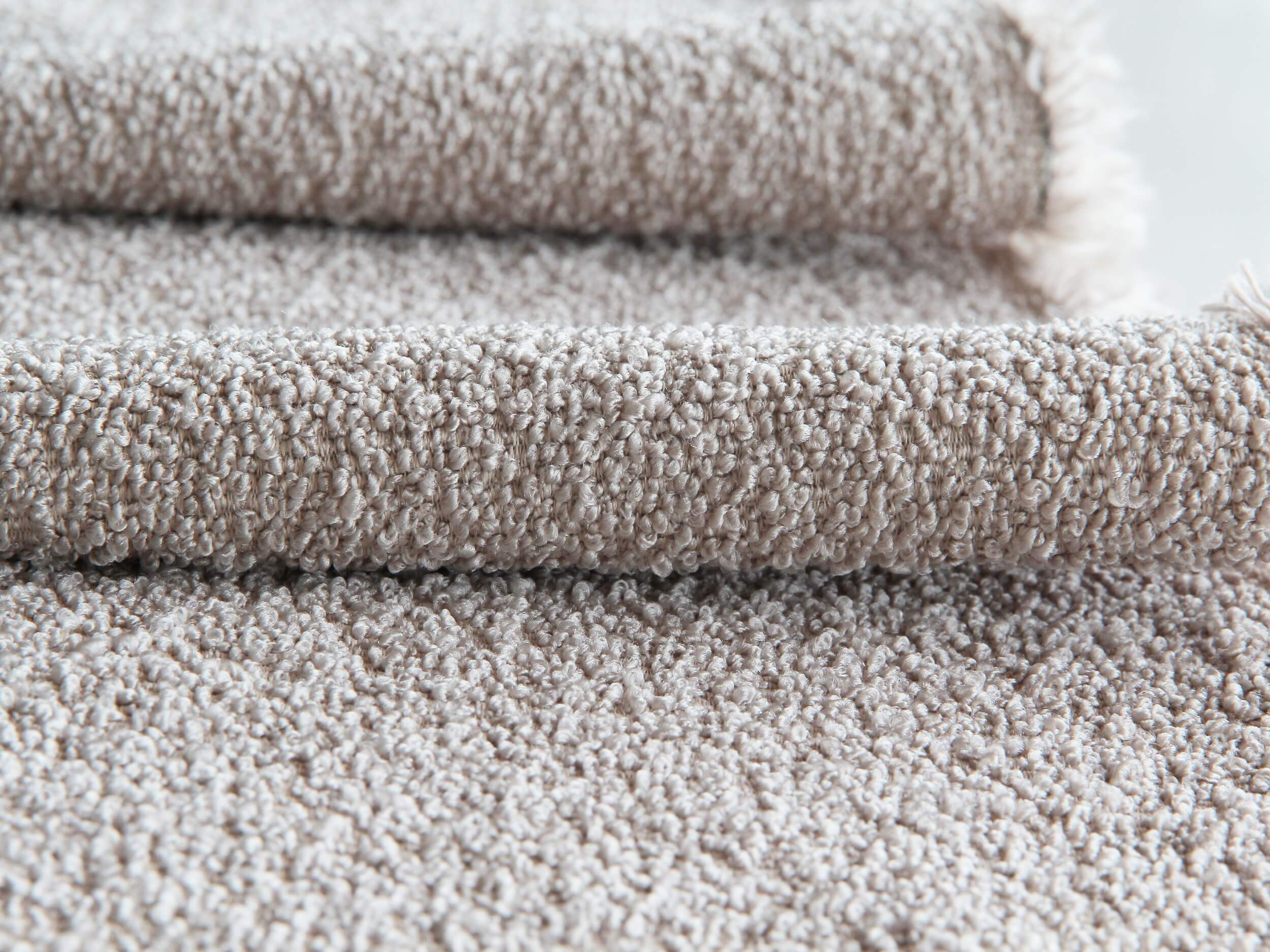 OATMEAL BOUCLE UPHOLSTERY